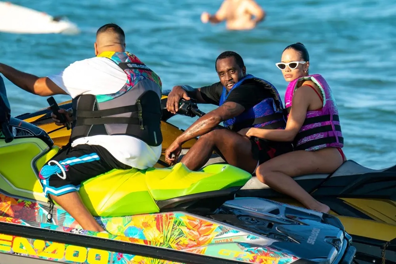Diddy rides a jet ski and enjoys a trip to the Miami beach with a ...