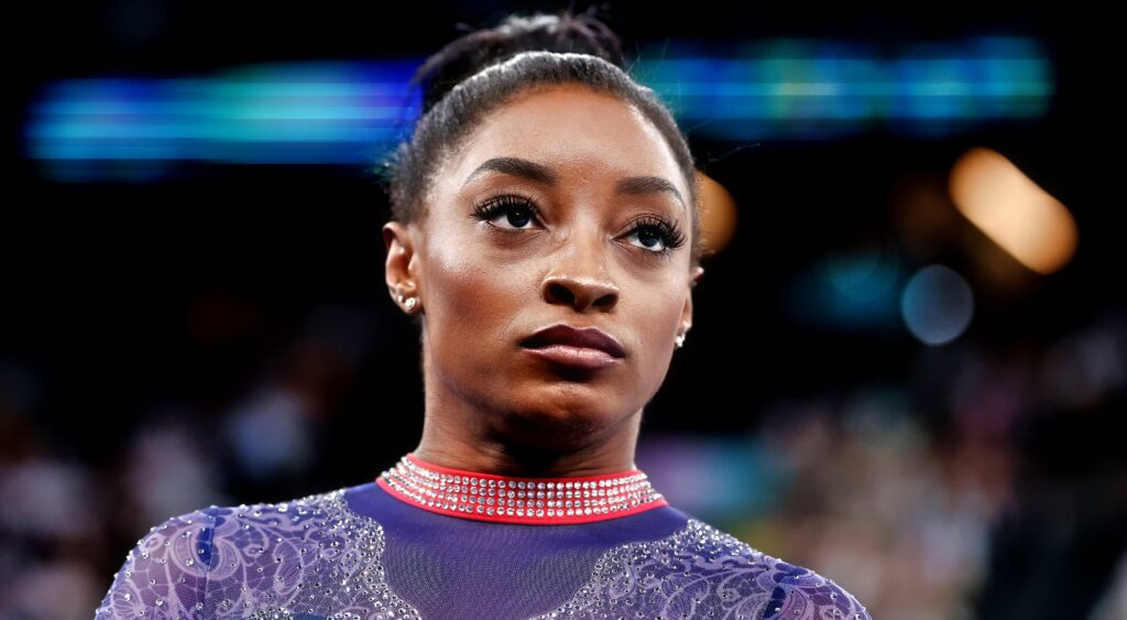 Simone BIles speaks out about her biological mother asking for ...